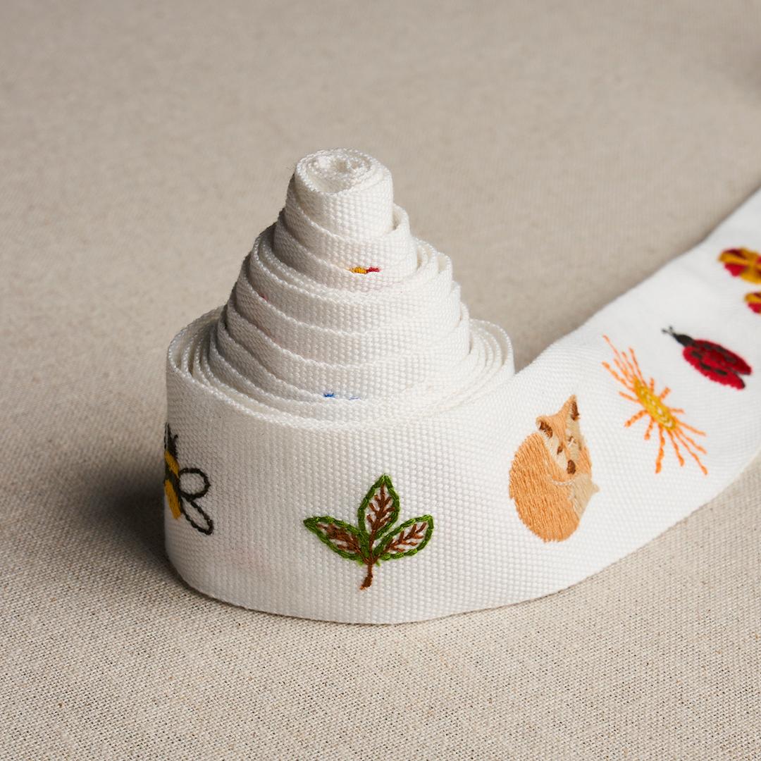 Tiny Things Embroidered Tape - Multi On Ivory Trims | Schumacher